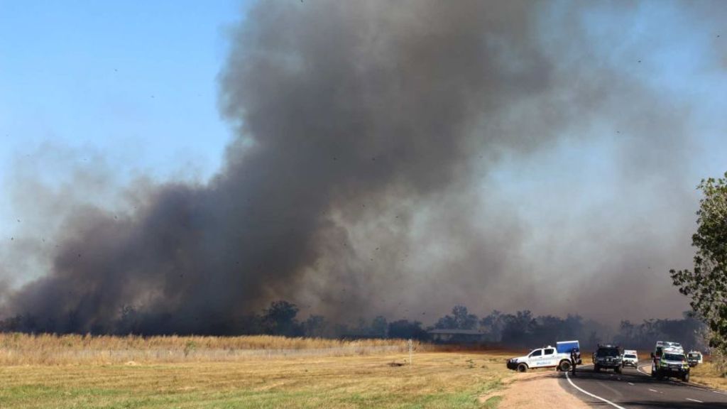 Waterbombing aircraft help contain fire near Darwin - ABC News
