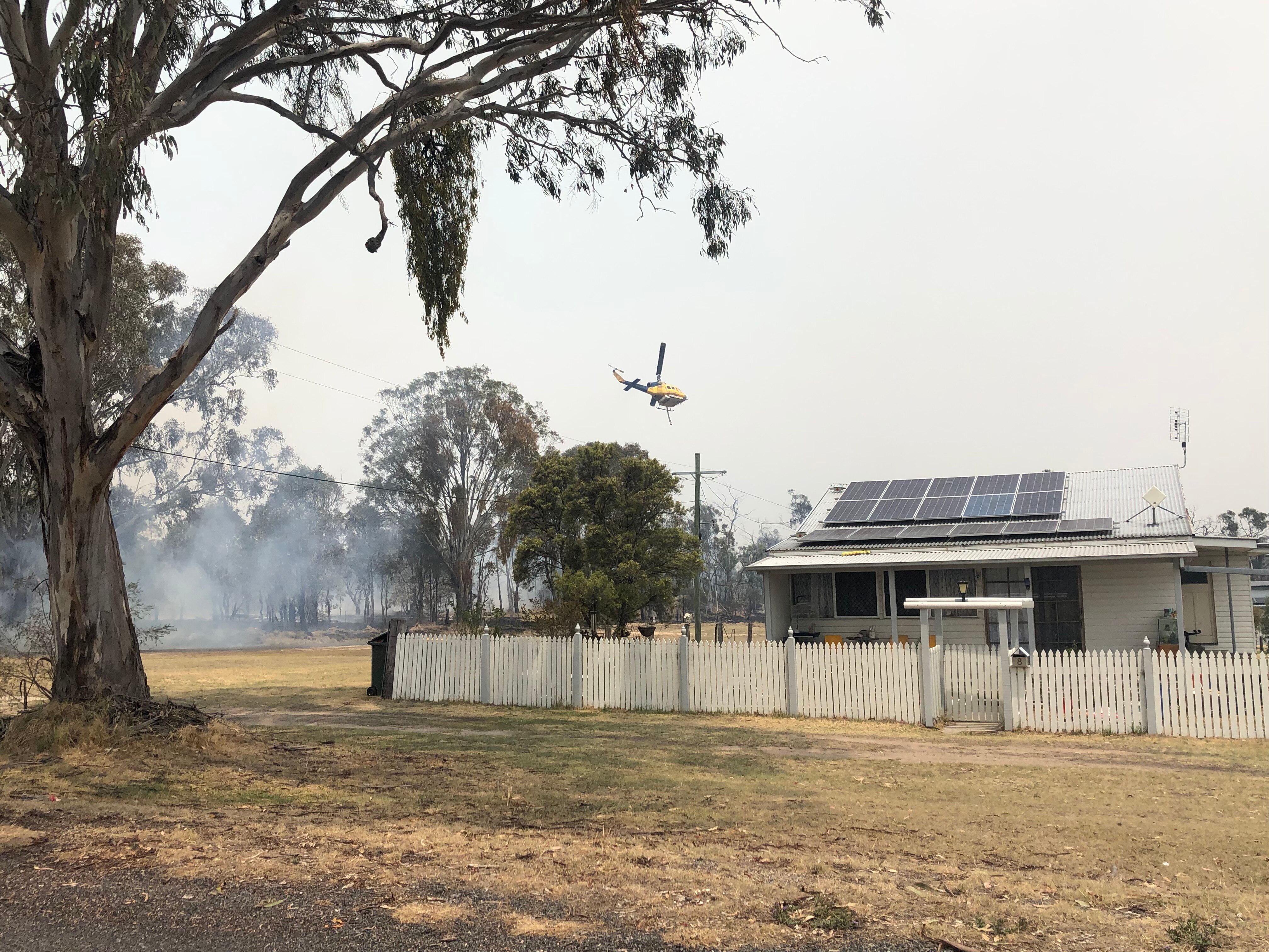 Firefighters battle multiple fire fronts around northern New South ...