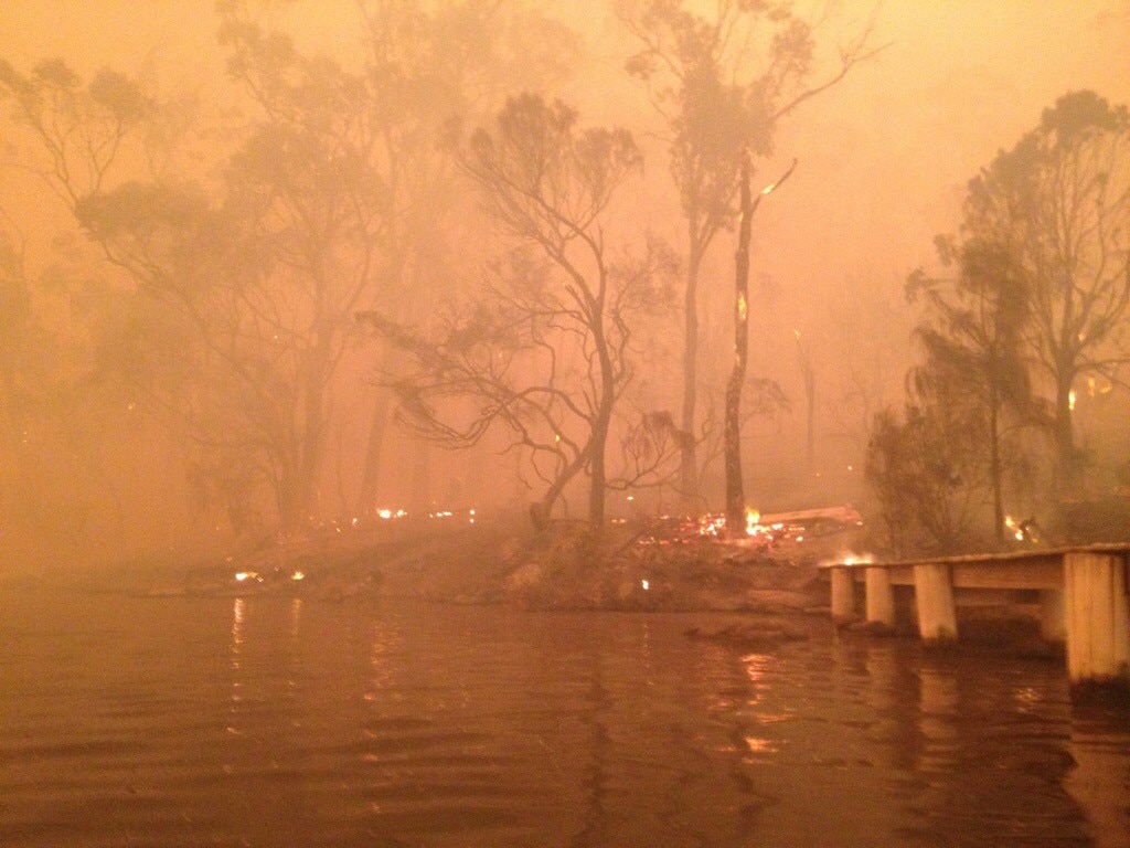 Holmes family who sheltered from Dunalley fire under jetty rebuild and ...