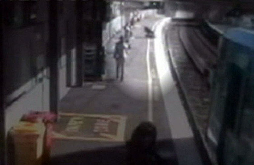 CCTV footage of baby falling on train tracks - ABC News