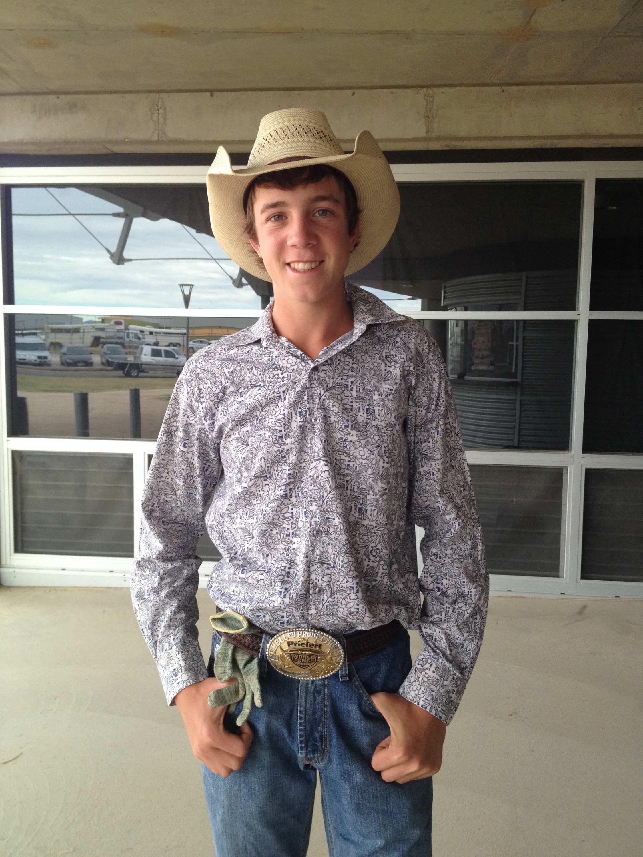 Teen takes home two new cars at team roping championships - ABC News