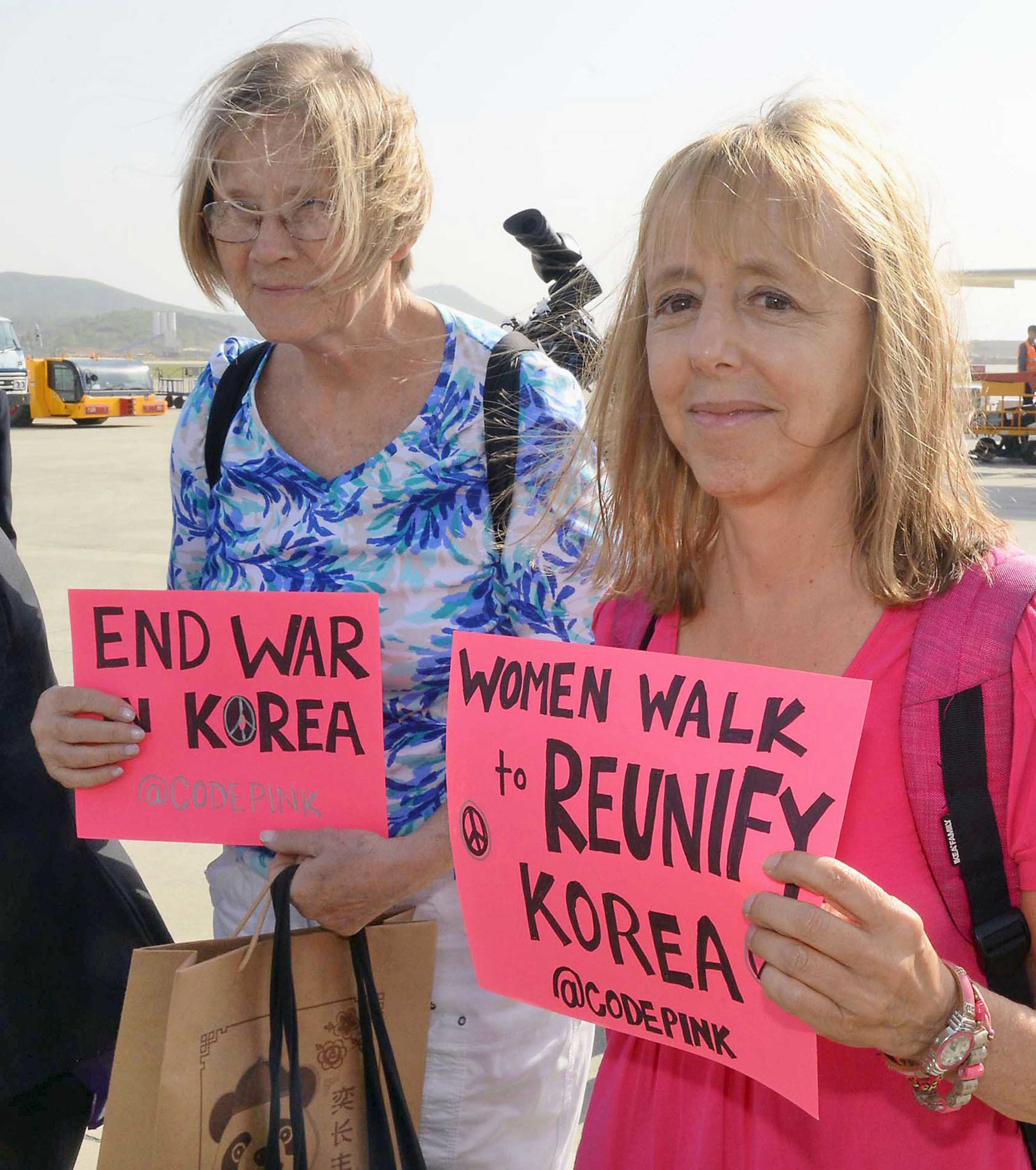 Women activists cross demilitarised zone separating two Koreas to ...