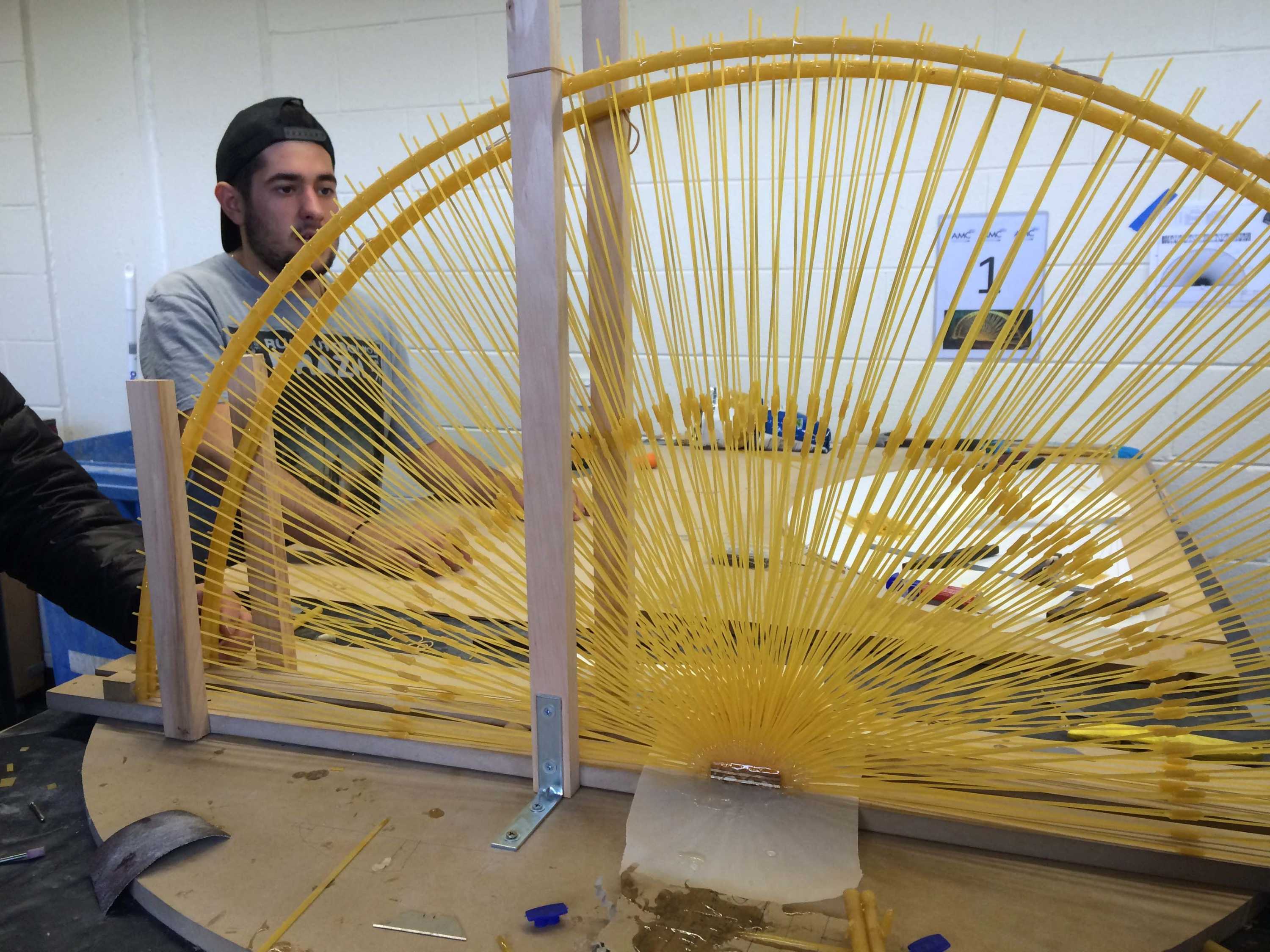Load-bearing 'pasta bridge' aims to break 279kg college record - ABC News