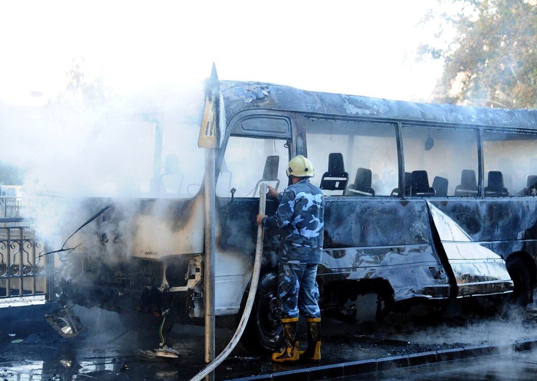 Children among 14 killed in roadside bomb attack on military bus in ...