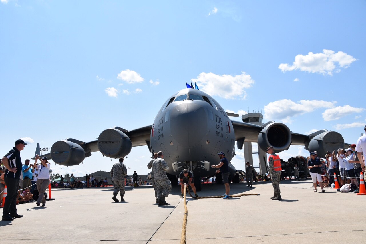 AFP commander and Australian strongman Grant Edwards pulls 190-tonne C ...