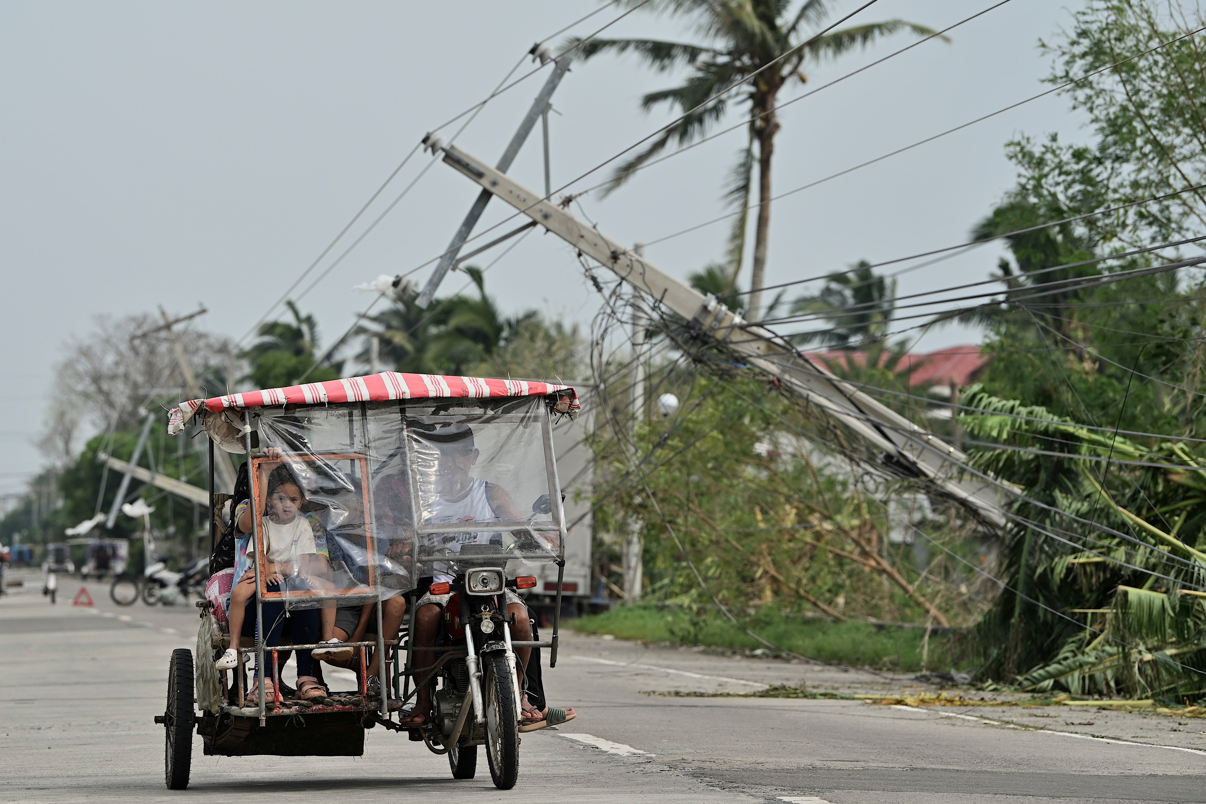 Storm-weary Philippines evacuates thousands as Typhoon Toraji hits ...