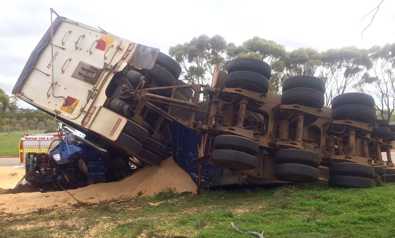 One dead, another freed from wreckage after Great Eastern Highway crash ...