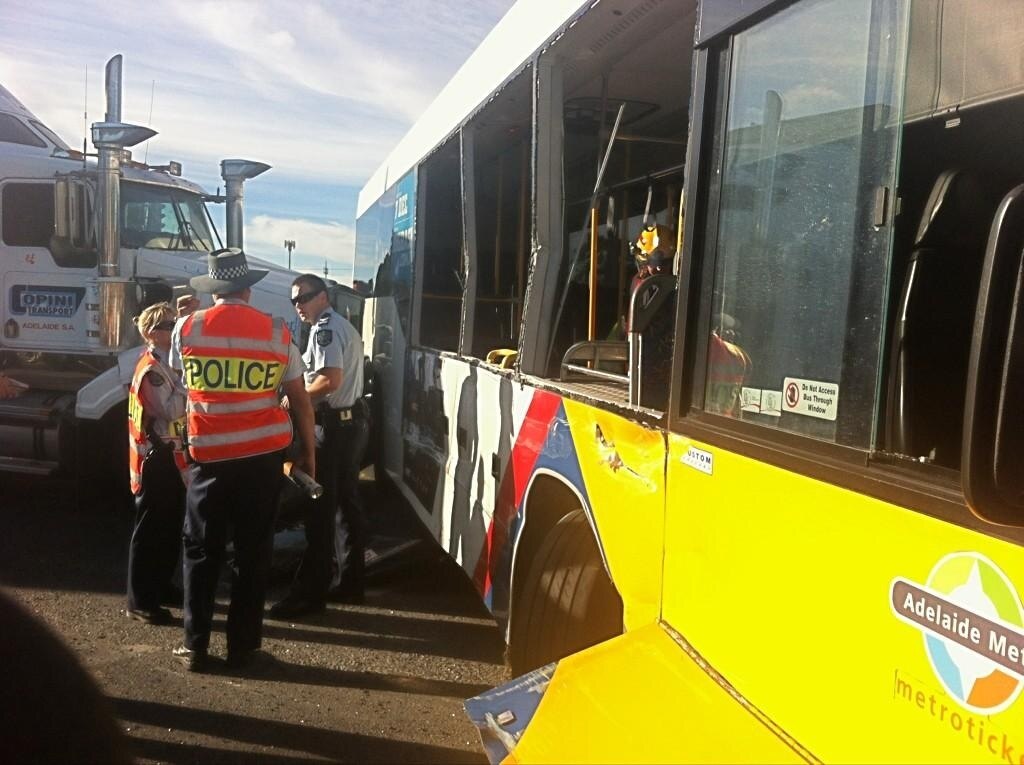 Cyclist, passengers injured after truck and bus collide - ABC News