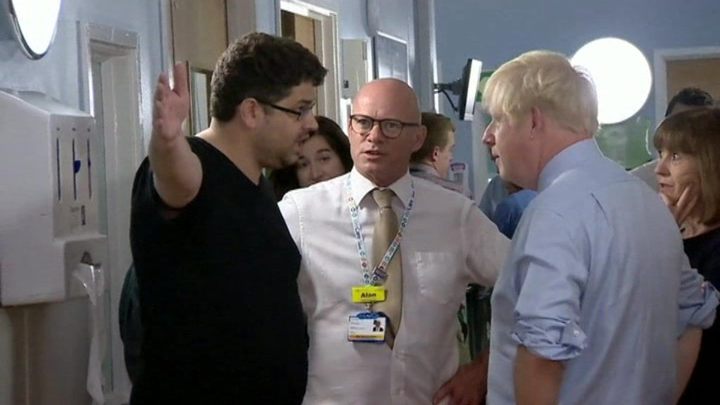 UK Prime Minister Boris Johnson confronted by angry parent at hospital ...