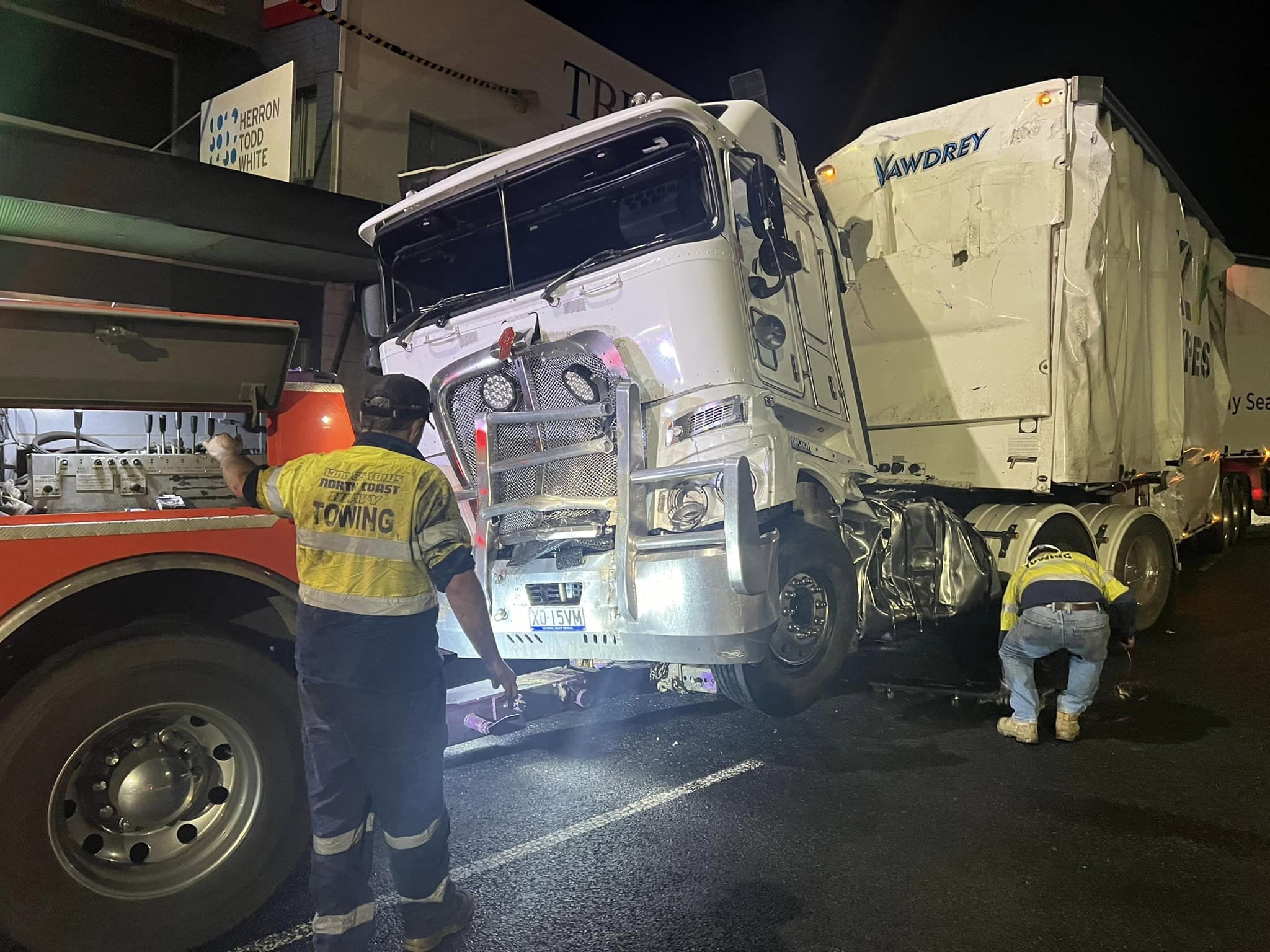 Pacific Highway closed for five hours after truck smashes into ...