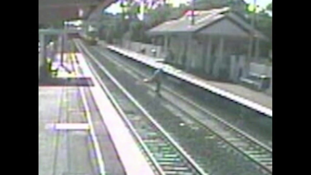 CCTV vision shows some of the near misses on the Queensland Rail ...