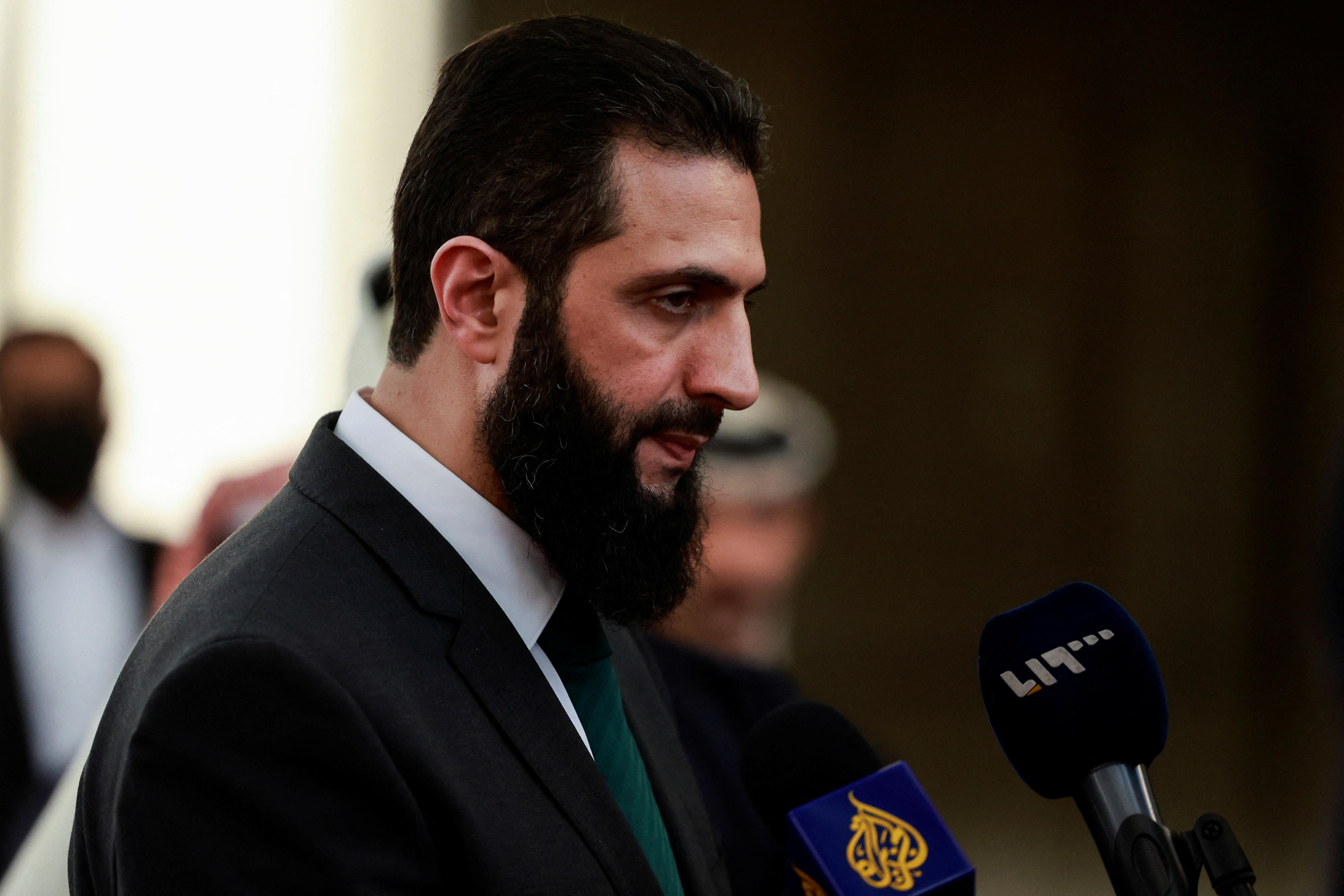 Syrian rebel factions agree to disarm and join new government under ...