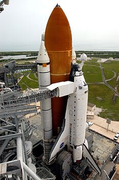 NASA begins delicate shuttle repairs - ABC News
