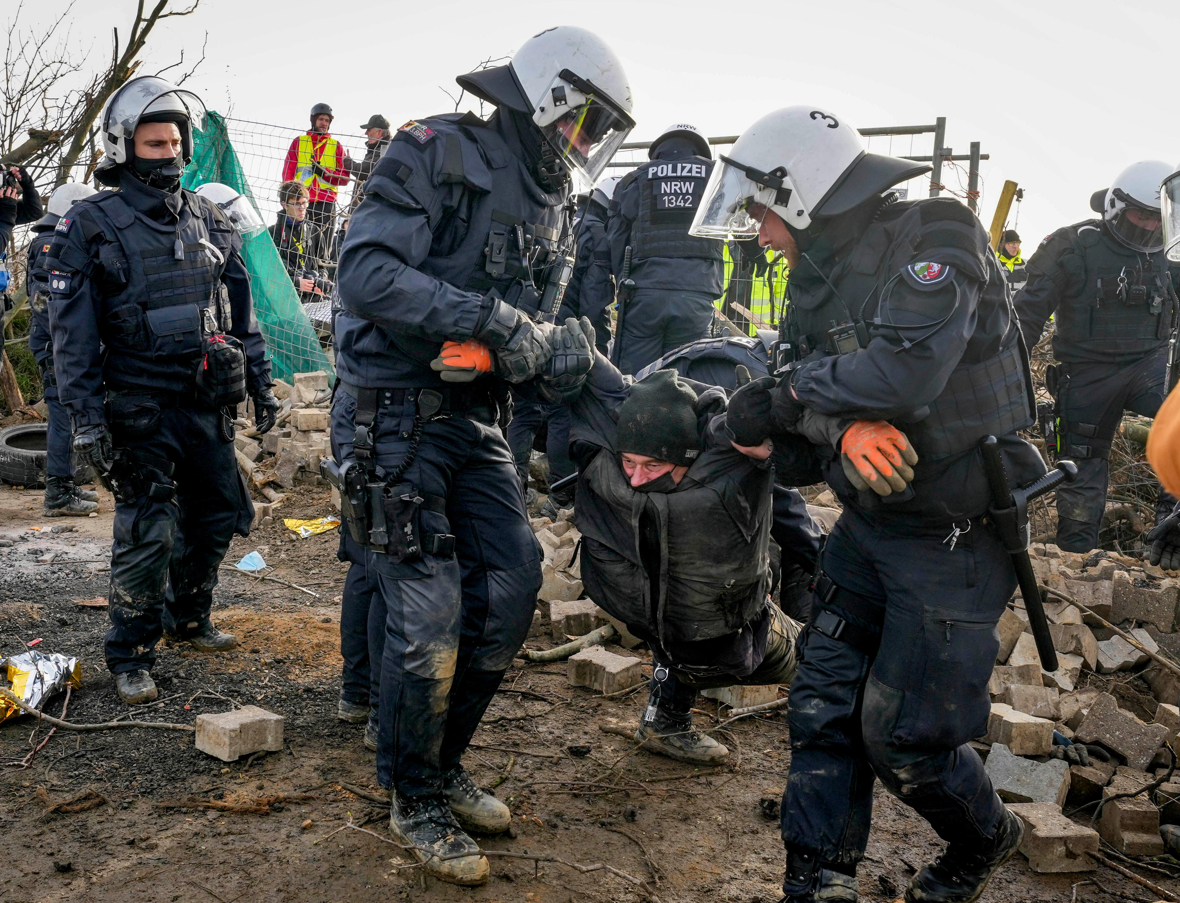 Tiny village sparks heated debate in Germany as protesters fight to ...