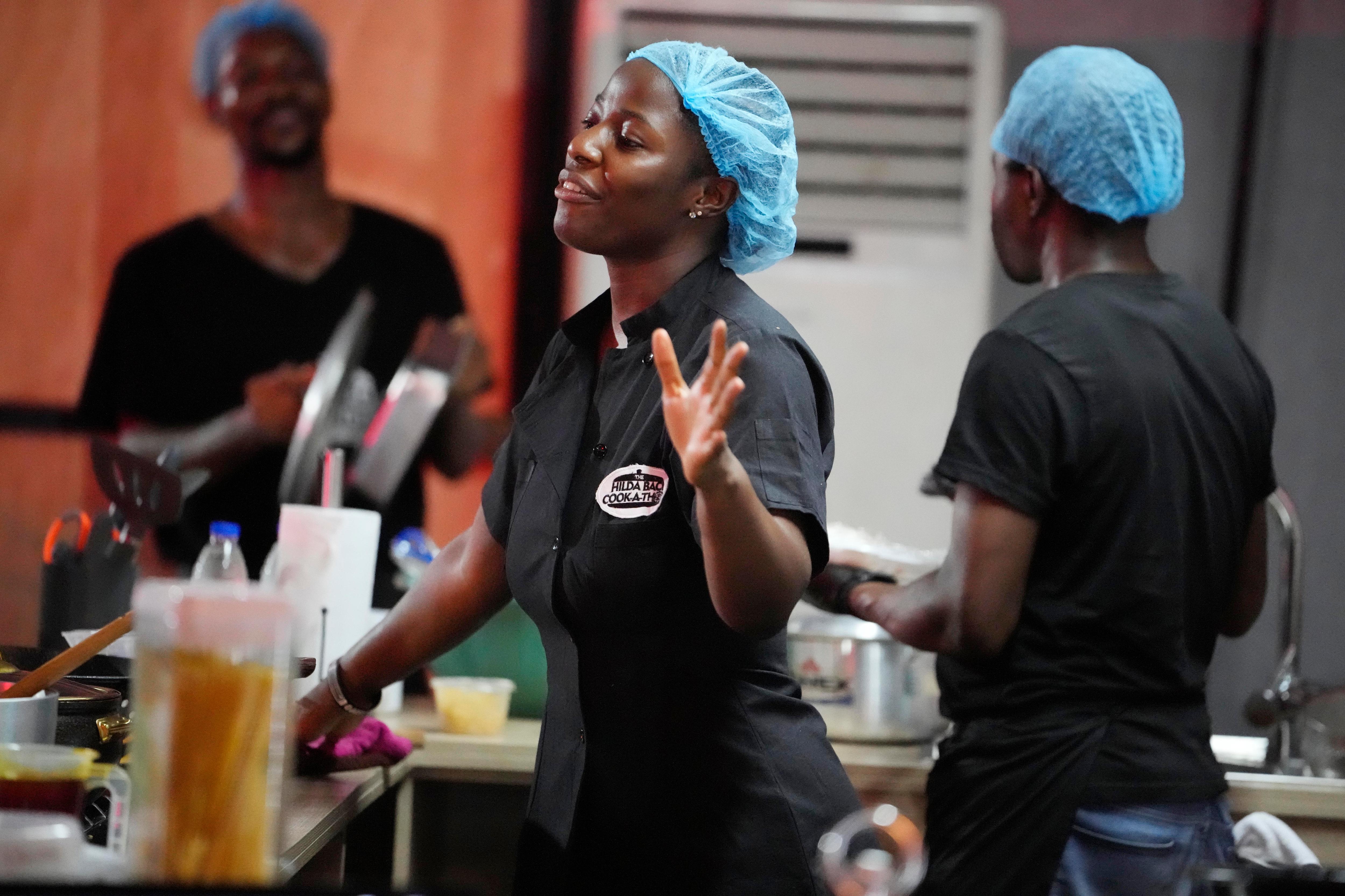 Nigerian chef cooks for 100 hours nonstop to set new record - ABC News