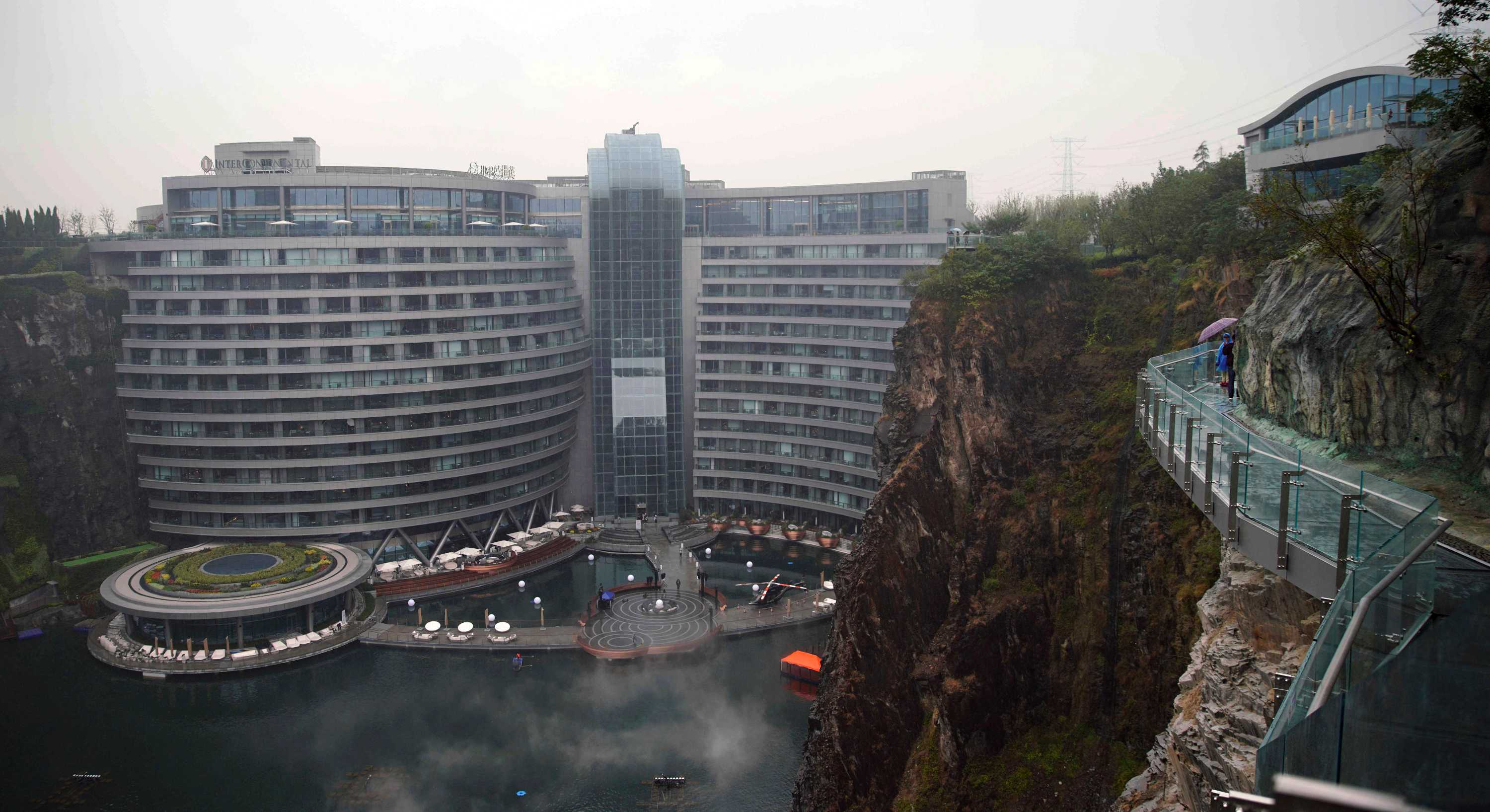 World's first 'ground-scraper' hotel built in former quarry opens its ...
