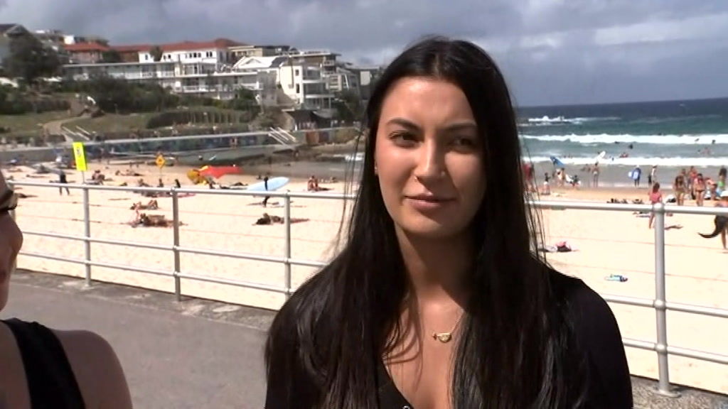 Beach-goers say they are aware of the the social distancing guidelines ...