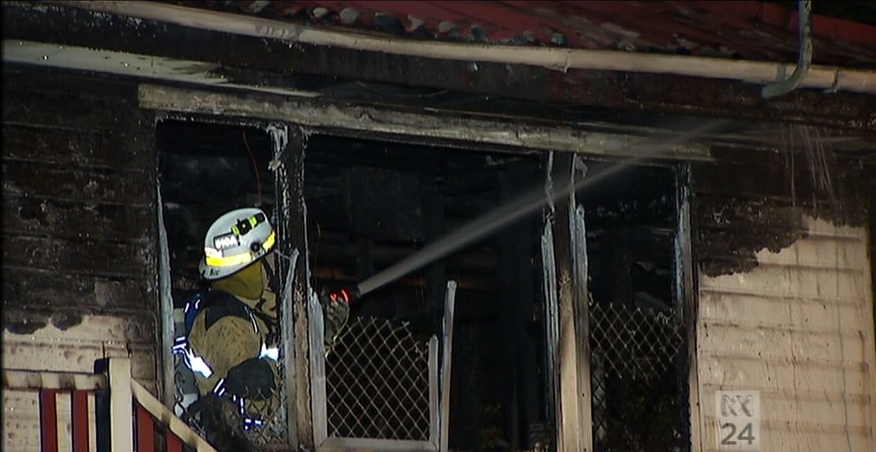 Unconscious man rescued from Brisbane house fire - ABC News