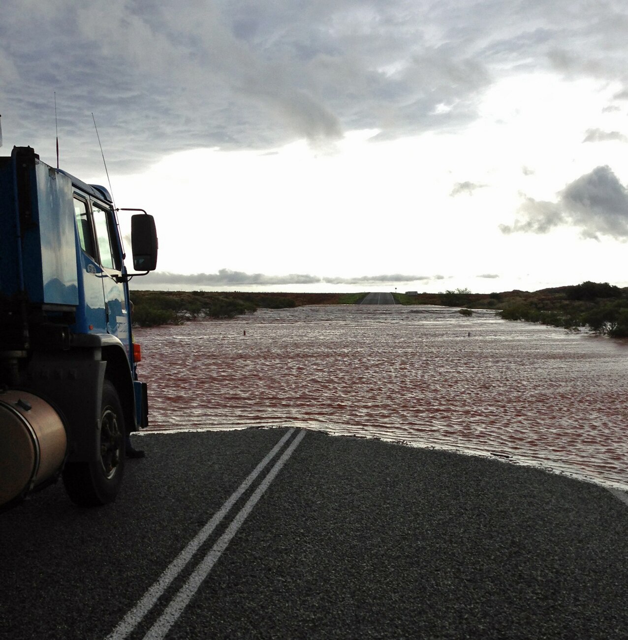 Flooding closes two major highways and number of roads stranding ...