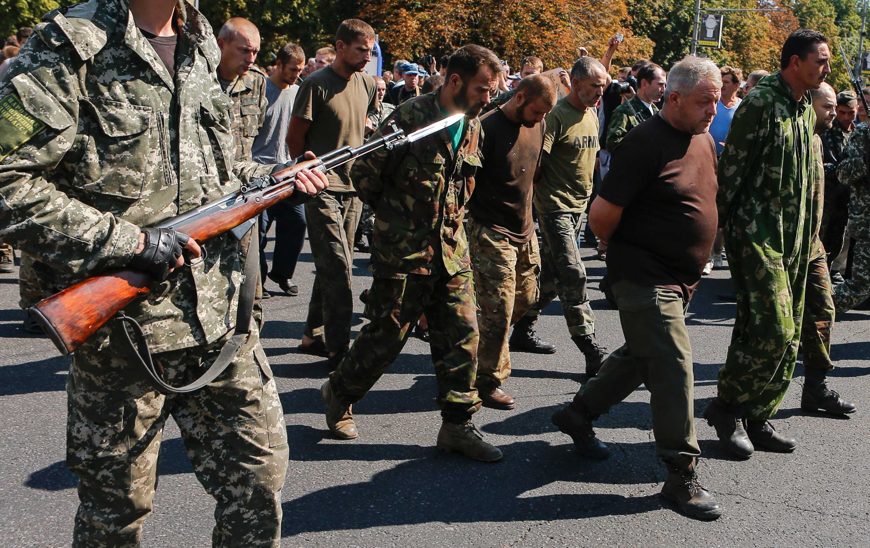 Ukraine crisis: POWs forced to march through rebel stronghold Donetsk ...