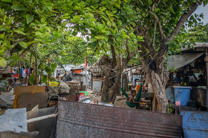 Betio is facing a population crisis, and a sea wall could be its only ...