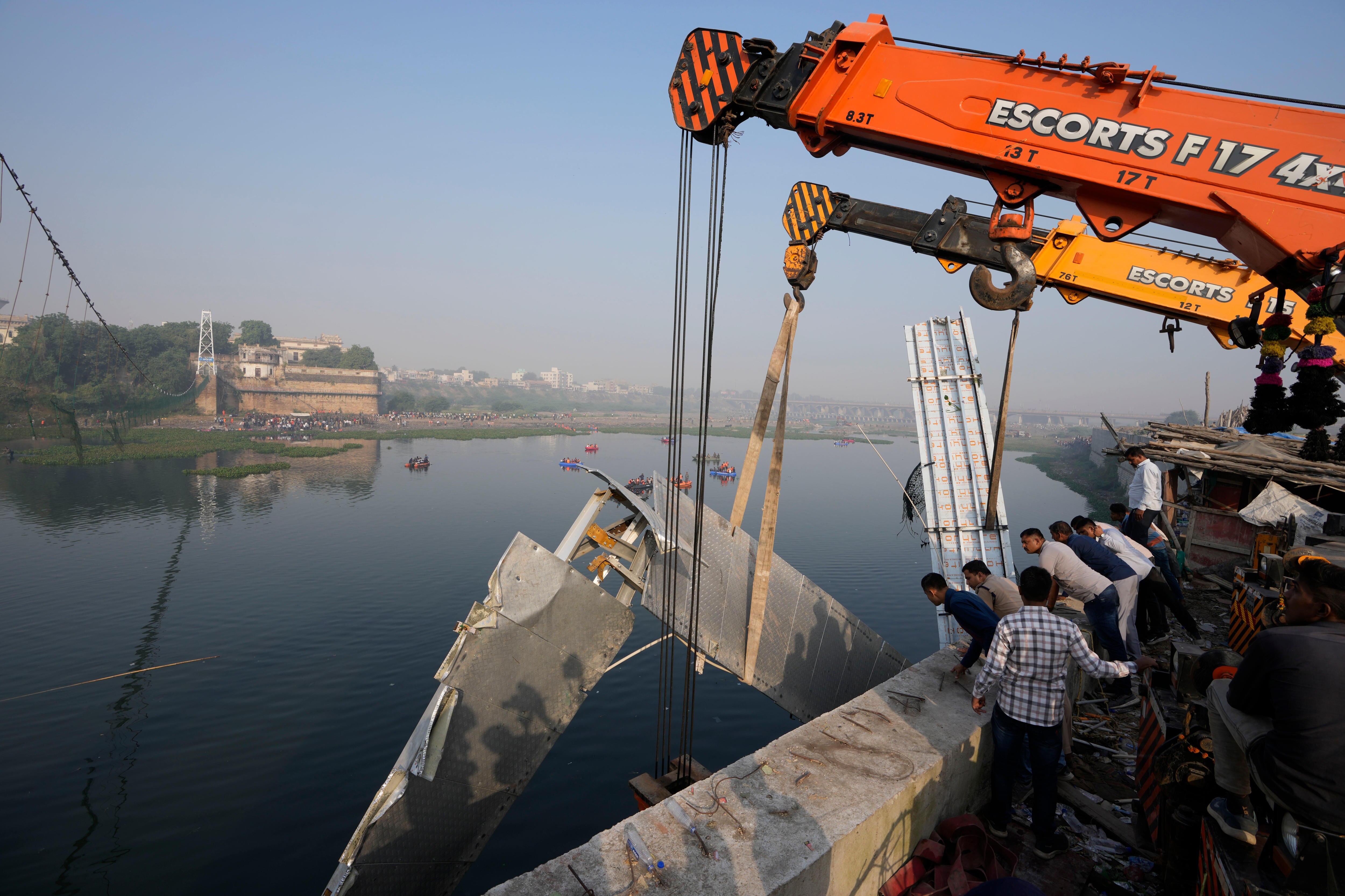 Police arrest nine people over Indian bridge collapse as death toll ...