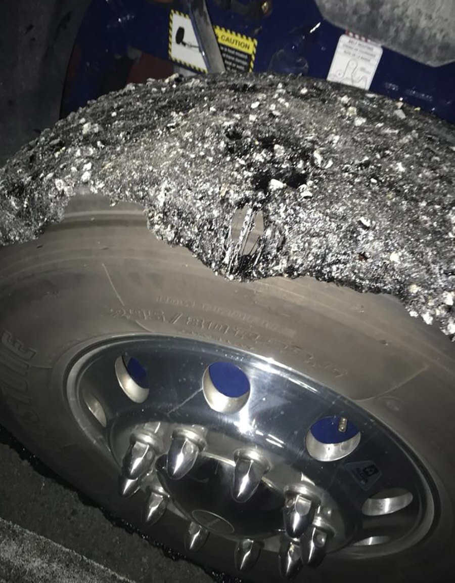 Bitumen melting on Bruce Highway south of Mackay trashes truck tyres ...