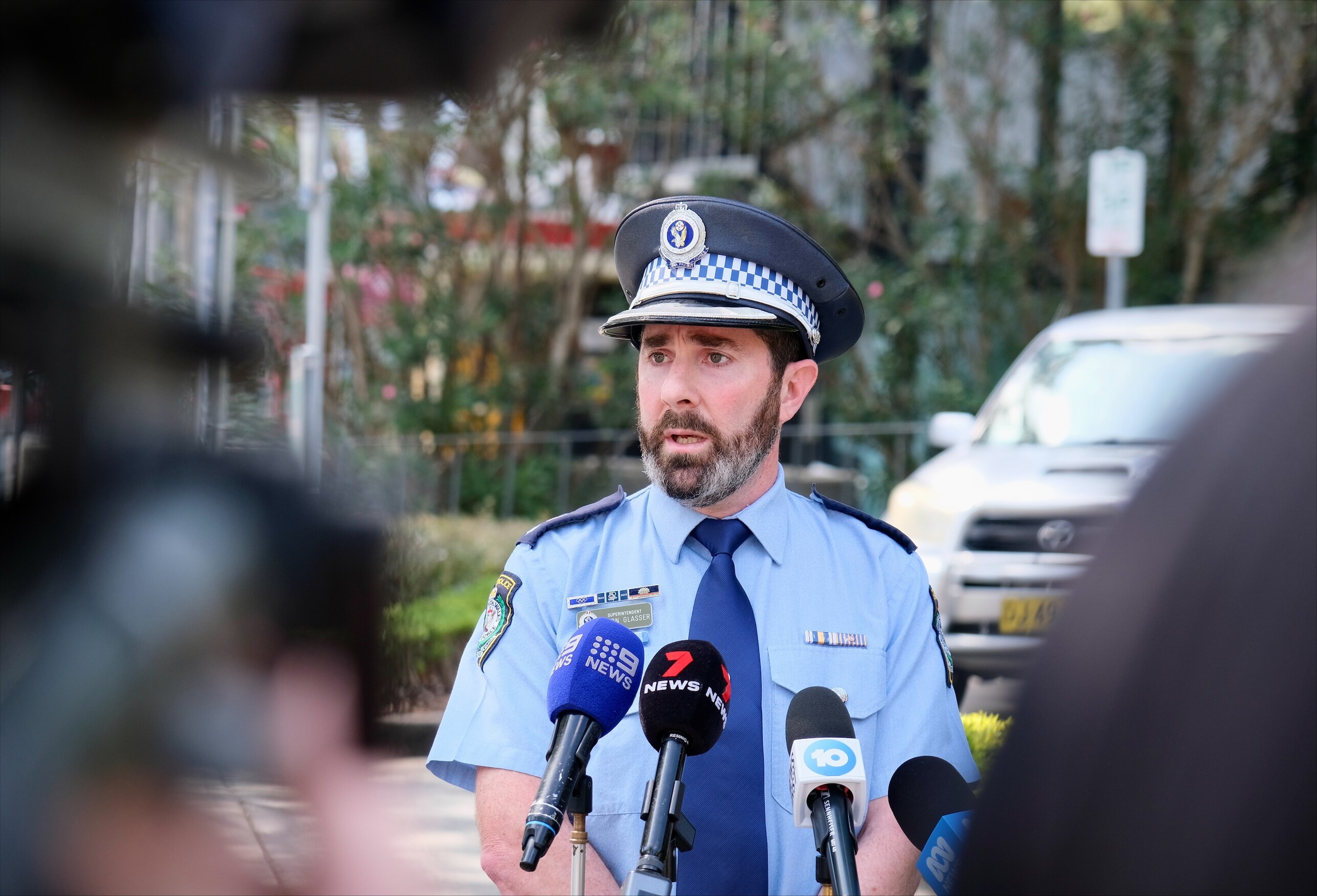 Woman and four young children 'caught in crossfire' of drive-by ...