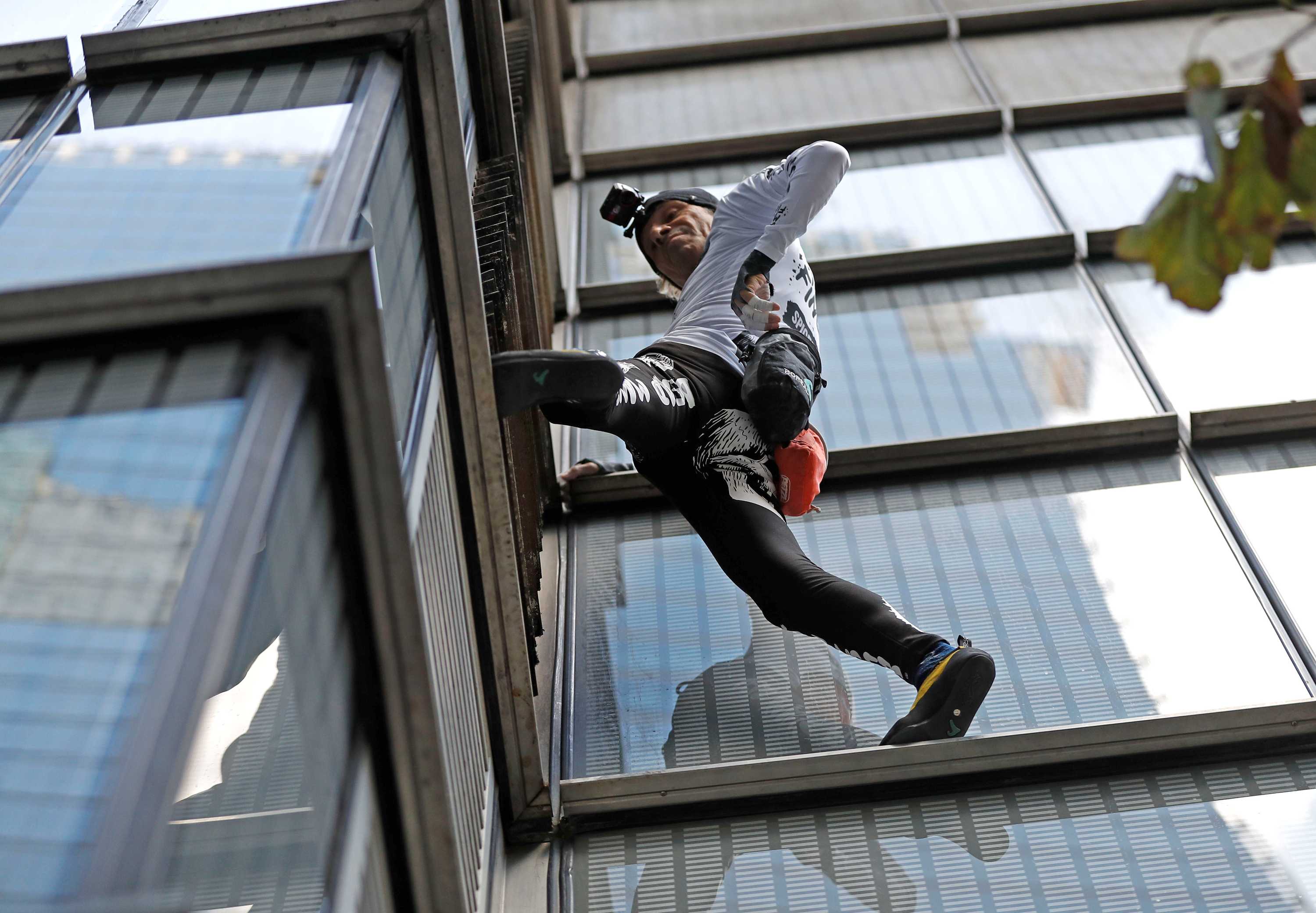 'French Spider-Man' Alain Robert arrested after free climbing 230m ...