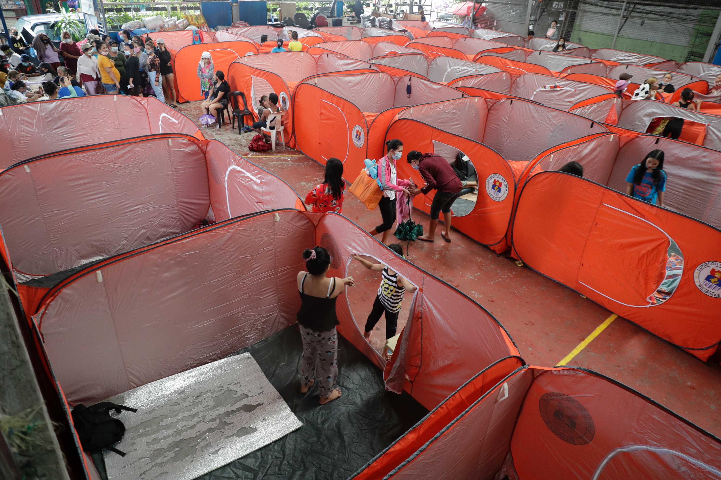 Typhoon Goni death toll rises as search continues for survivors in ...