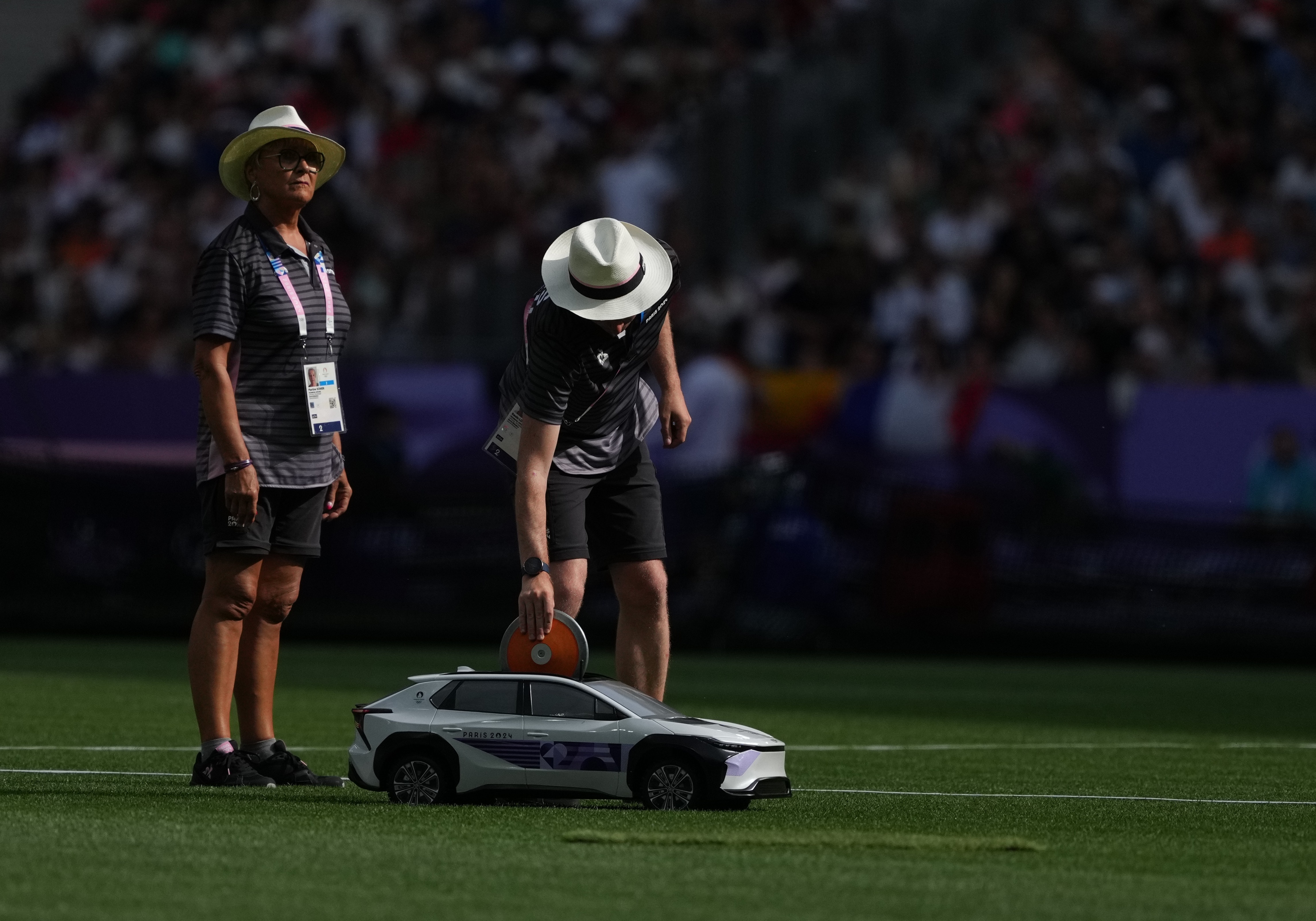 What are the little remote controlled cars on the field at the Olympics ...