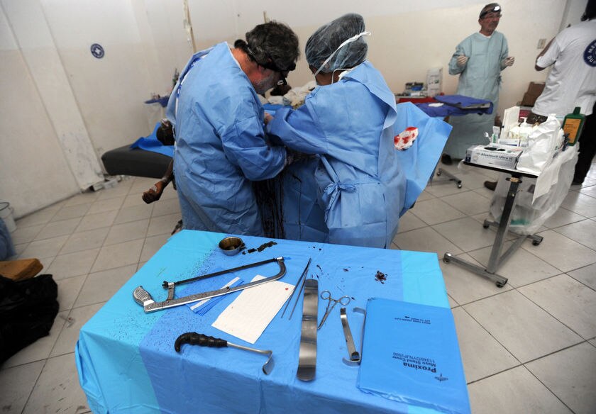 Doctors amputate quake survivors 'on the go' - ABC News