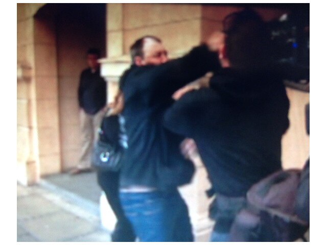 TV cameraman punched in face outside Adelaide courts - ABC News