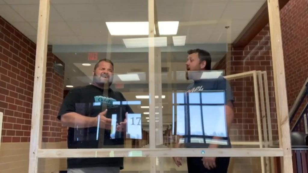 Plastic spit shields like these are being recommended for choirs - ABC News