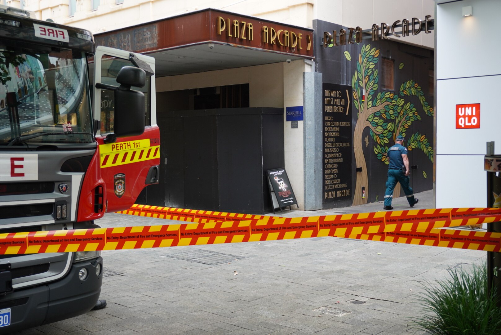 Perth CBD rescuers free man trapped in tiny cavity after falling ...