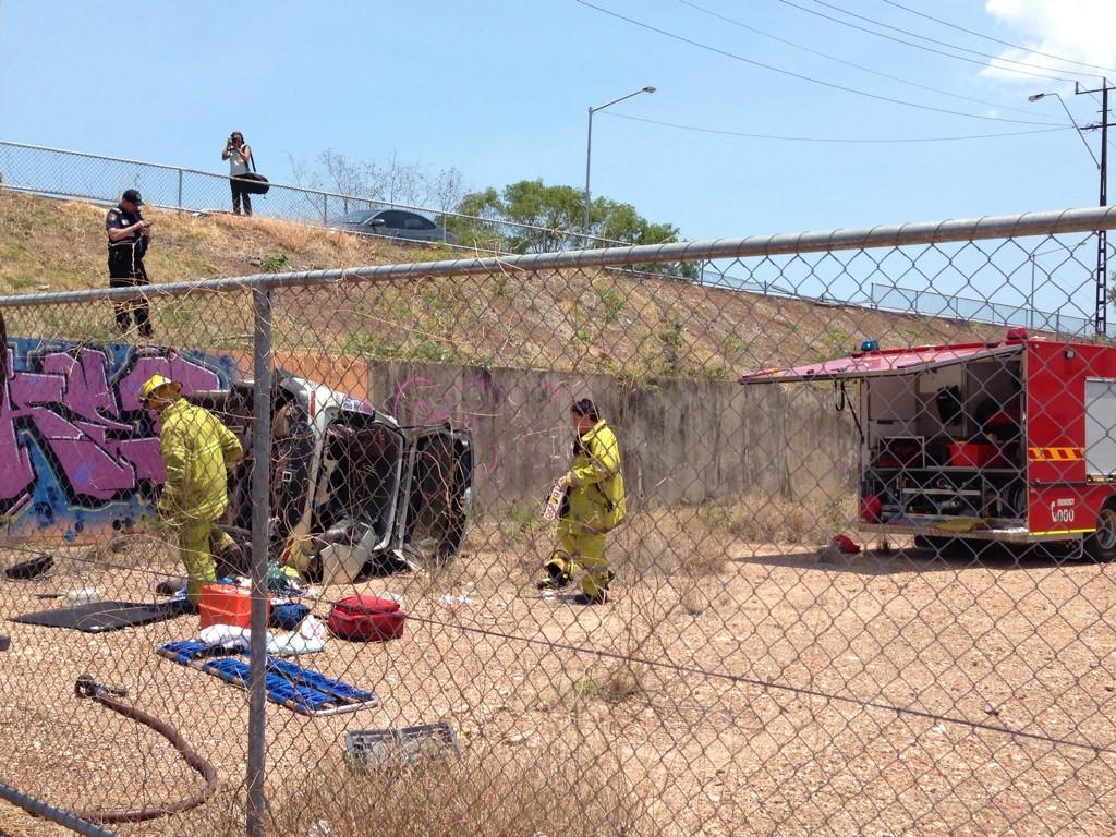 Car flips, plunges down embankment of Daly Street Bridge, witness says ...