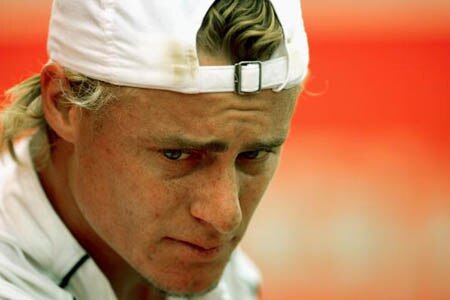 Hewitt cruises as Reid beaten at Queen's - ABC News