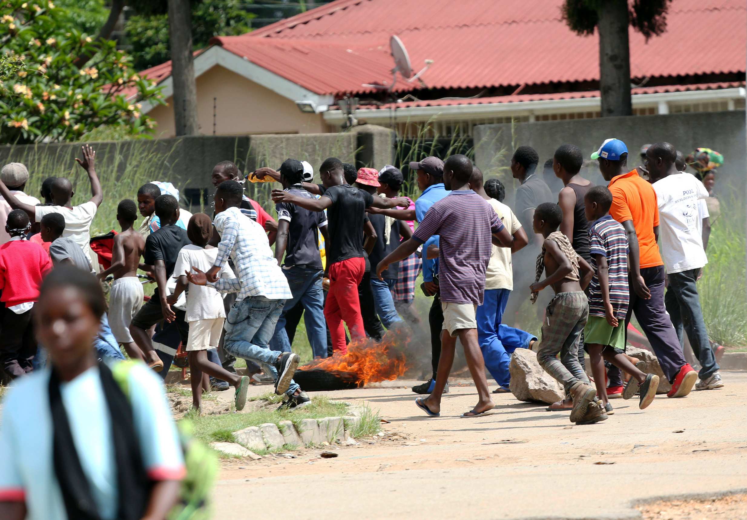 Zimbabwe protests turn deadly after petrol prices become most expensive ...