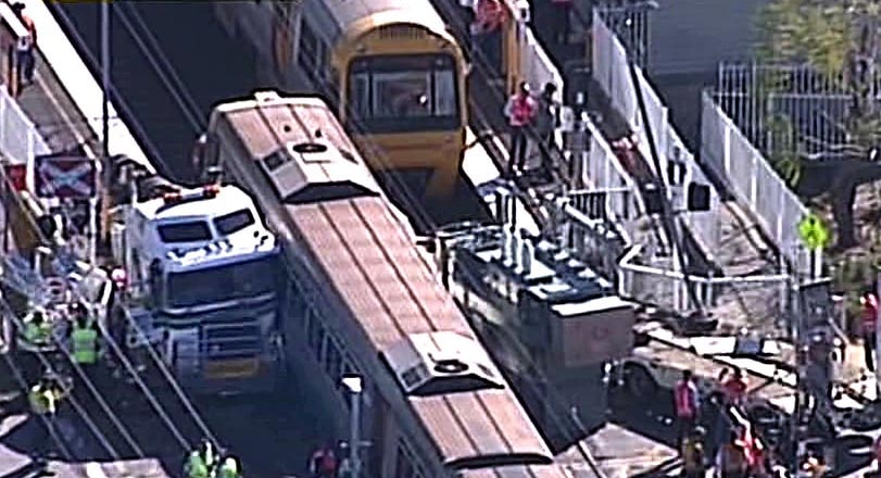 Train smashes into truck at Brisbane level crossing - ABC News