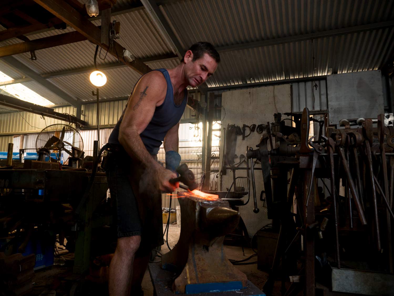 Blacksmith forges new life with iron art after near-fatal motorcycle ...