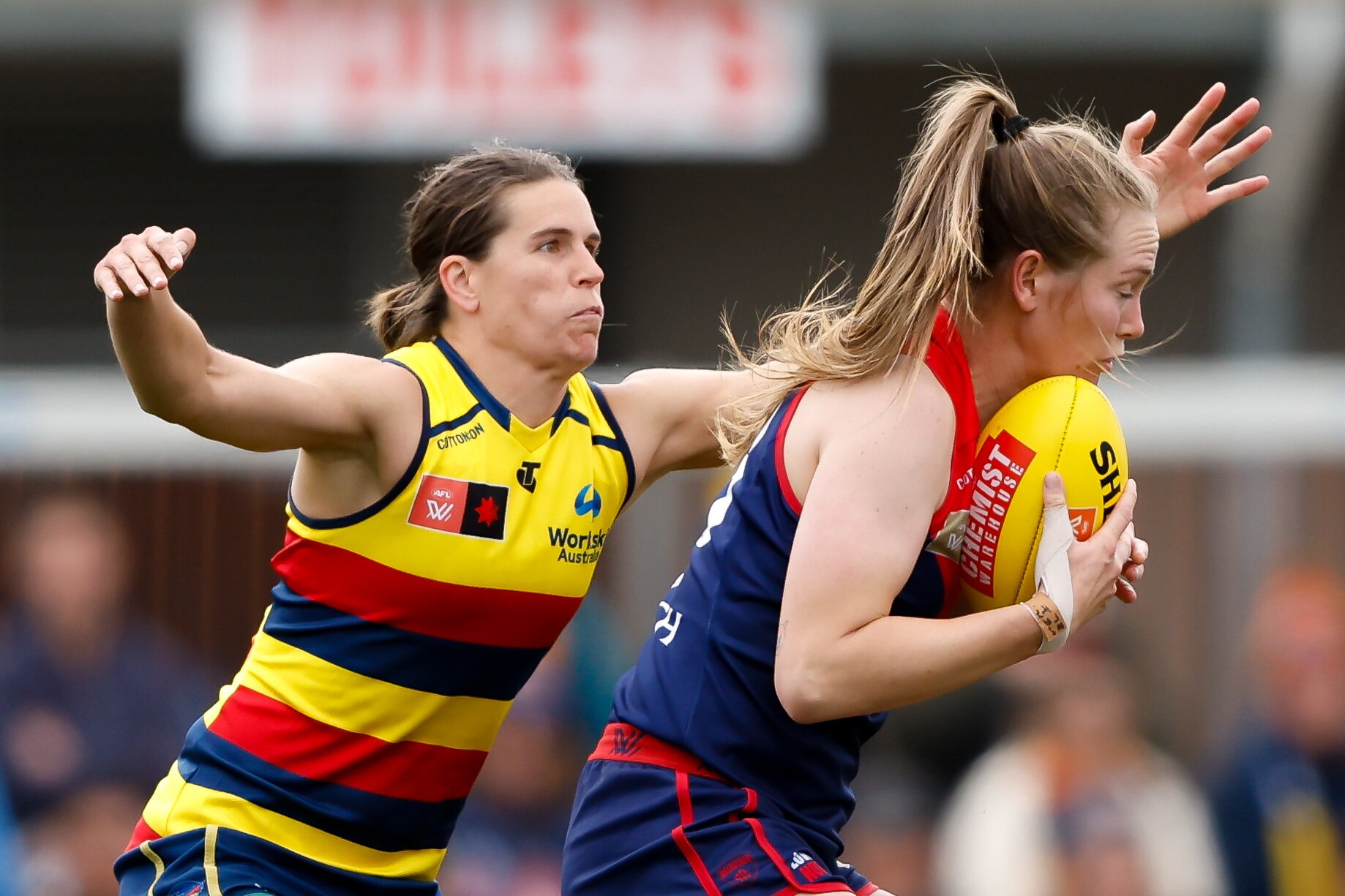 Crows beat Demons by 10 points to go outright top in AFLW as Magpies ...