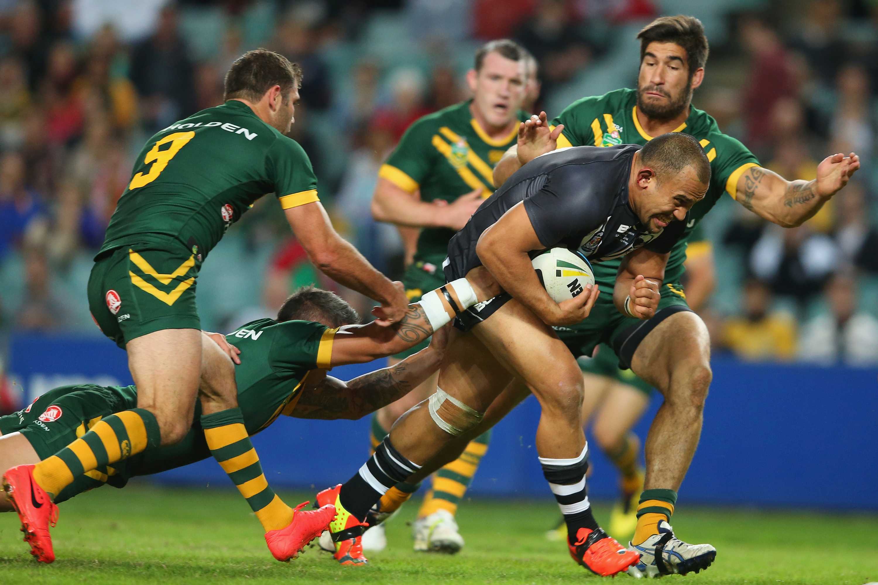 Sydney Roosters' Sam Moa and Shaun Fensom of the Canberra Raiders to ...