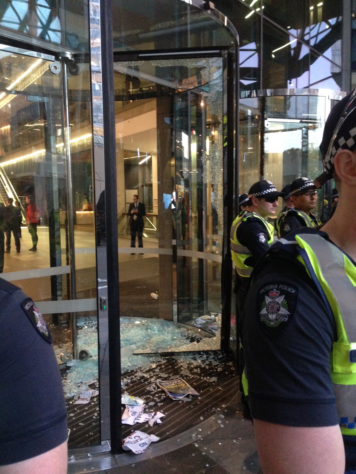 Student protesters clash with police, smash window outside Christopher ...