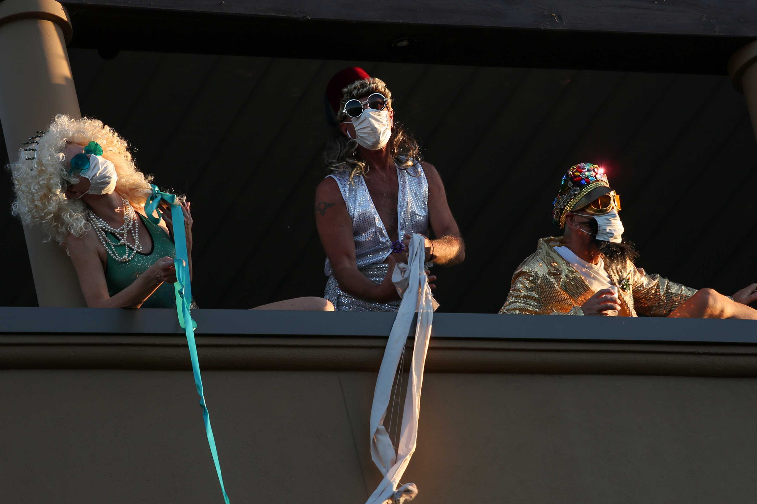 Coronavirus isolation can still be fabulous: Housemates create dress-up ...