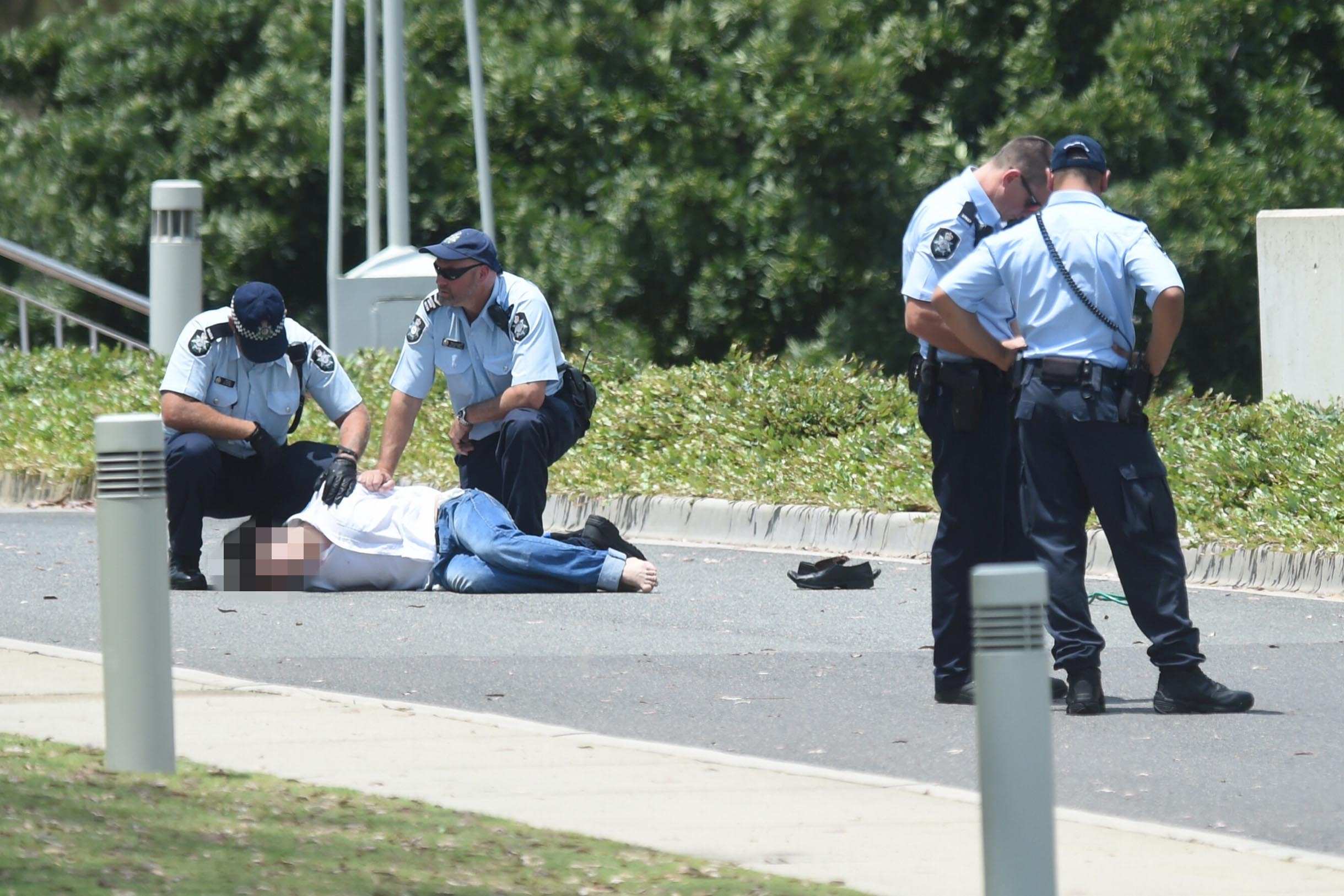 Police detain man armed with knife outside Parliament House in Canberra ...