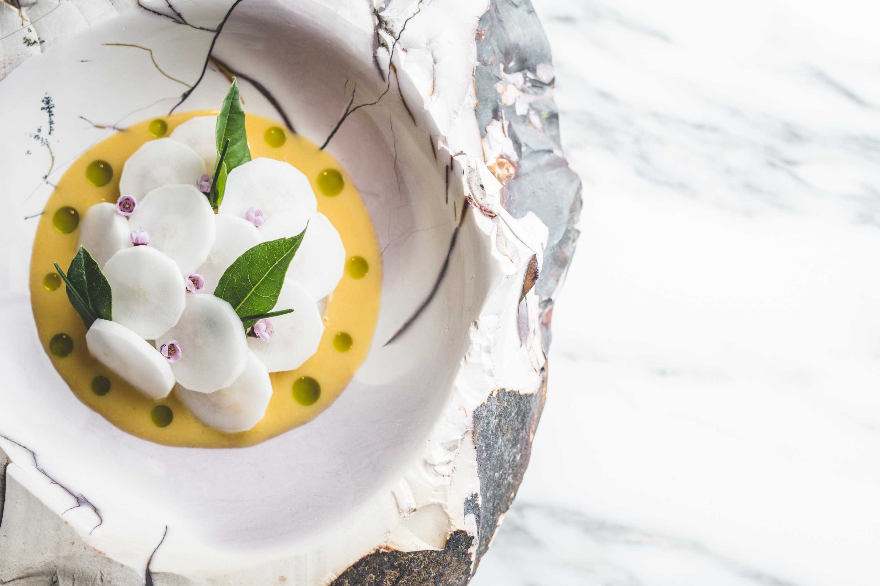 Pearl meat, wax, boab tuber, and charred avocado - ABC News