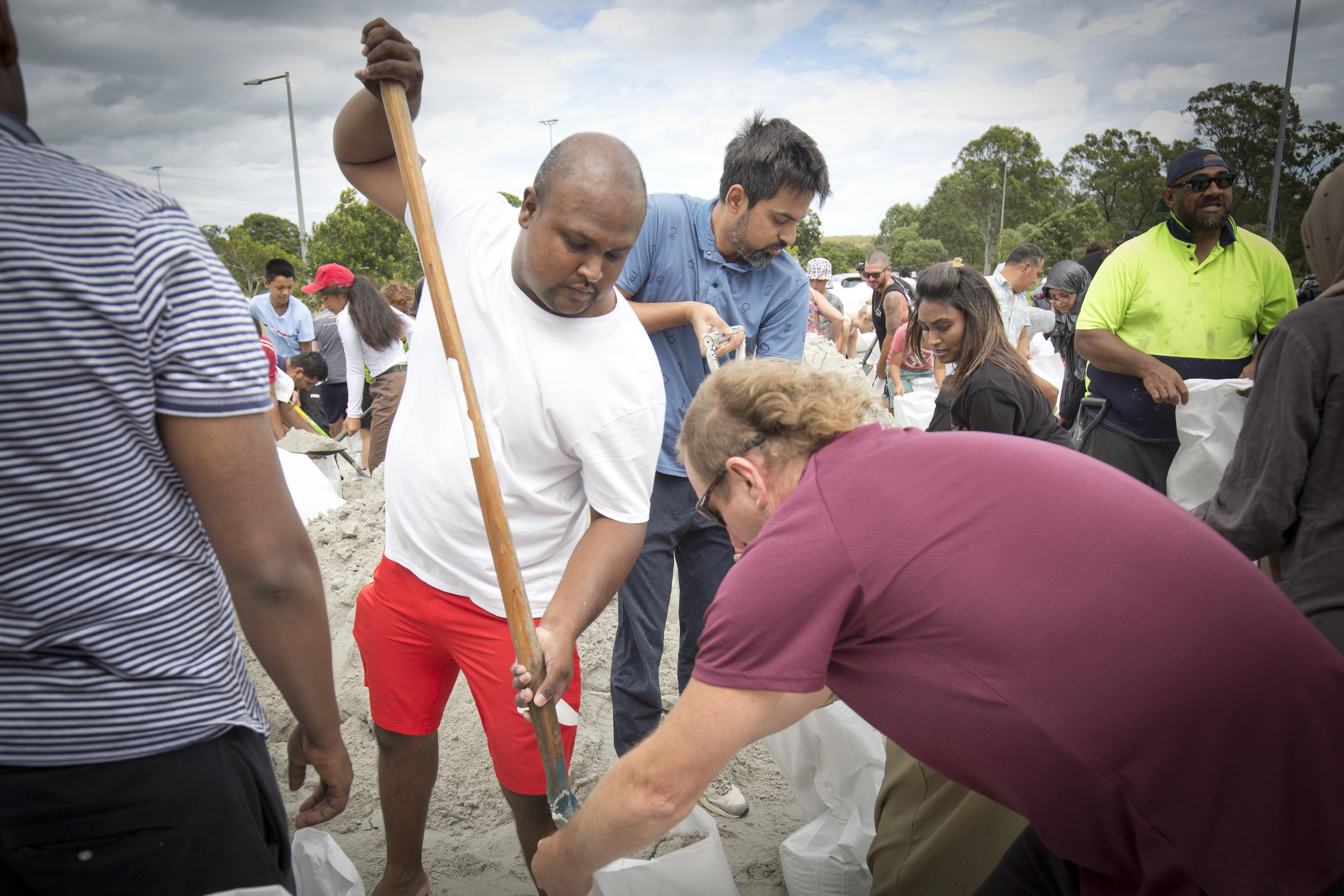 Logan community comes together to help each other ahead of Cyclone ...