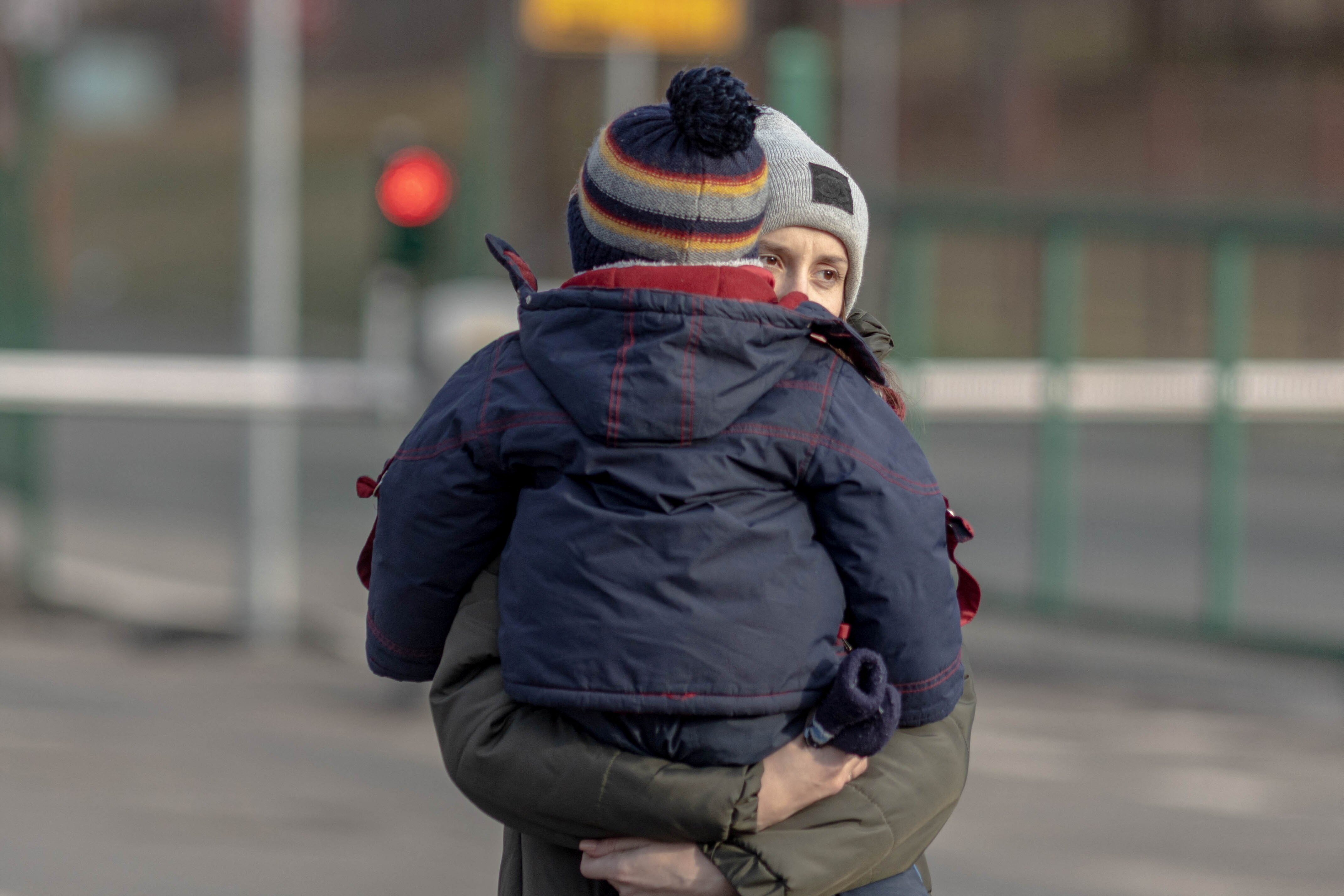 Photos show the grim reality of Ukraine's women, children searching for ...