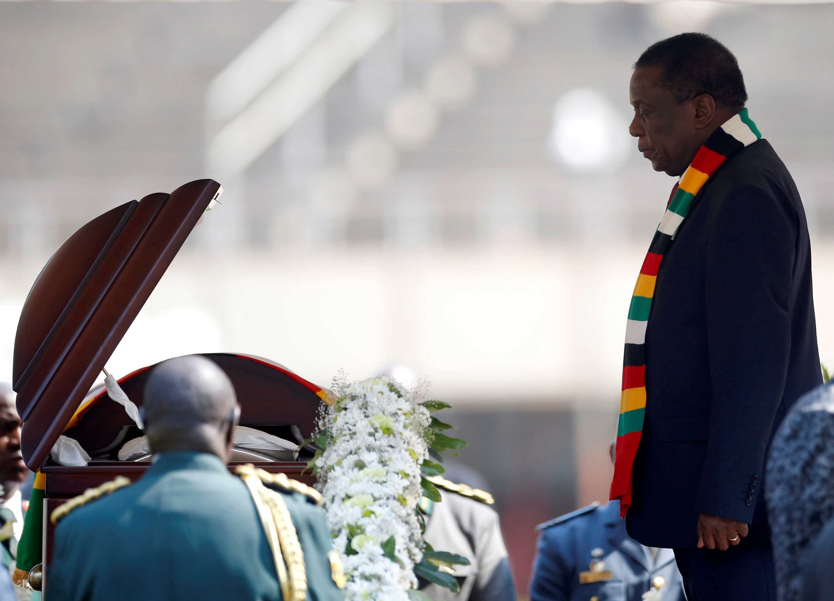 Zimbabwe bids farewell to Robert Mugabe in sparsely attended state ...