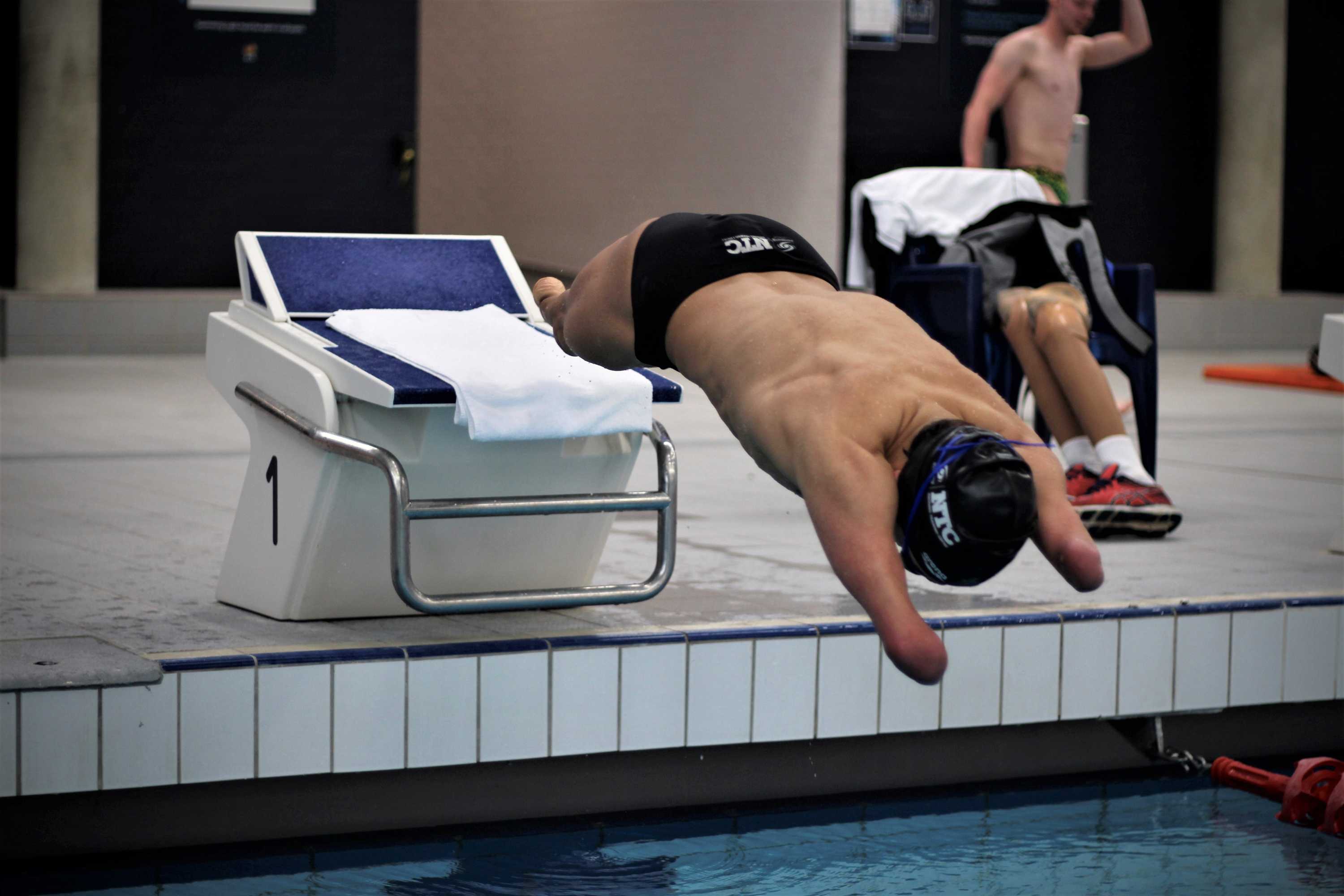 As COVID-19 continues to shut down sporting events, Paralympian Ahmed ...